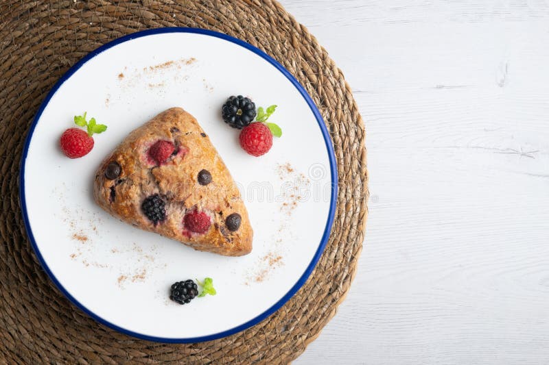 Triangular English Scones with Blackberries, Raspberries and Chocolate ...