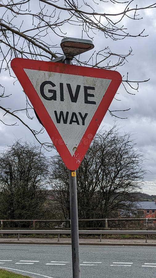 Triangular give way sign stock photo. Image of sign - 243050466
