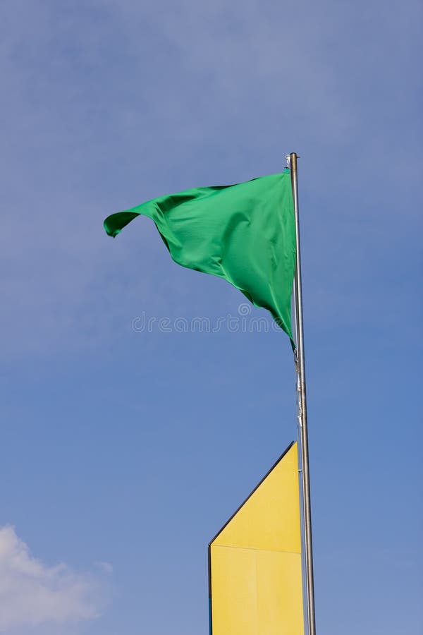 Triangular green flag. stock image. Image of waving, mast - 45943887