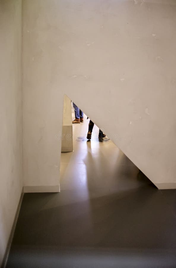 Triangular Hole in the Wall Stock Photo - Image of geometric, shadow ...