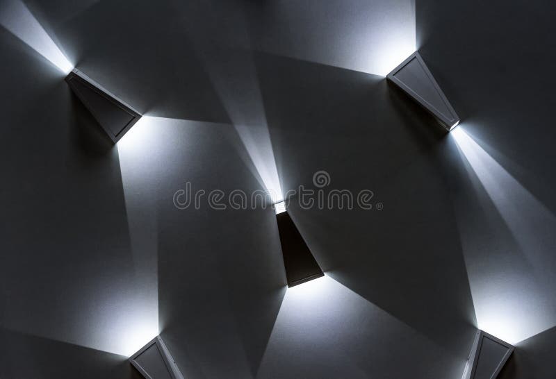 Triangular LED Lamps with a White Glow. LED Lighting in the Interior ...