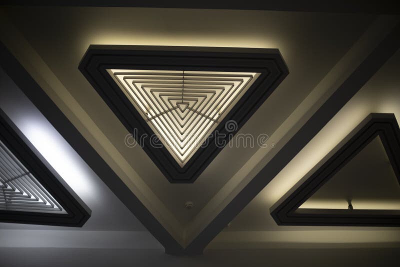 Triangular Light Source. Lamp in Interior. Designer Light Stock Photo ...