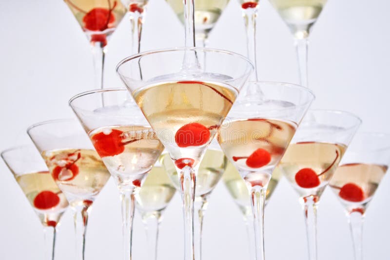Triangular Martini Glasses, Filled with Champagne with Cherries Built ...