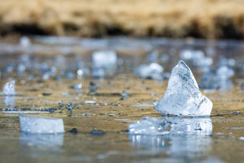 Triangular Piece of Ice in a Frozen Lake in Gredos with Bokeh Effect ...