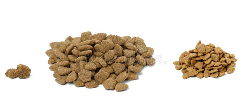 Triangular Pieces of Animal Food on a White Background. Pile of ...
