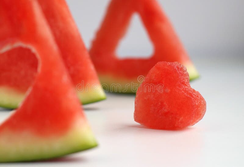 Triangular Pieces of Watermelon with a Heart, Cut from the Pulp of a ...