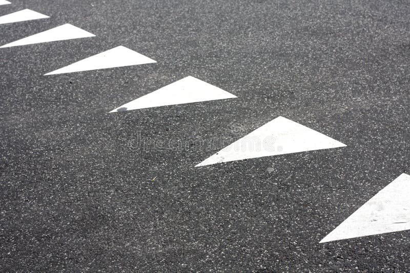 Triangular road markings stock image. Image of highway - 9915591