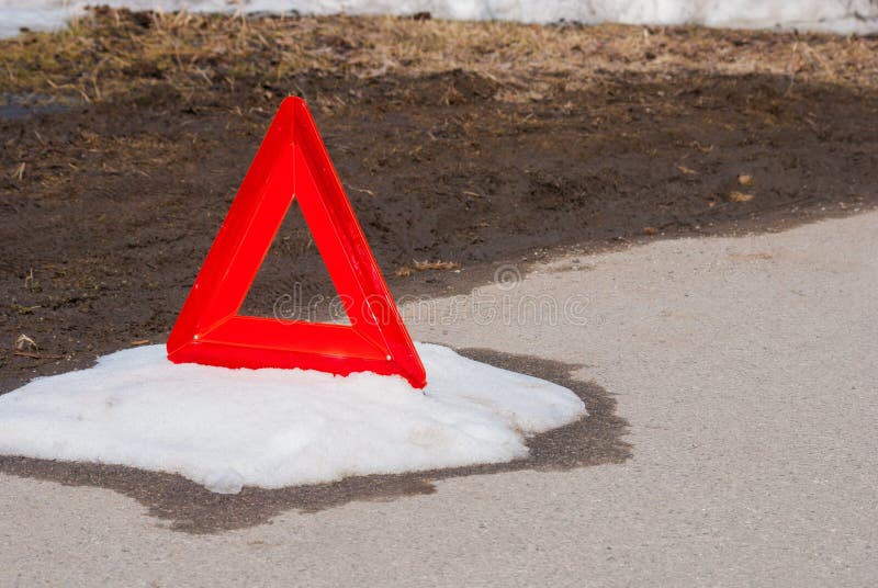 A Red Road Sign on the Ground Stock Photo - Image of road, street ...