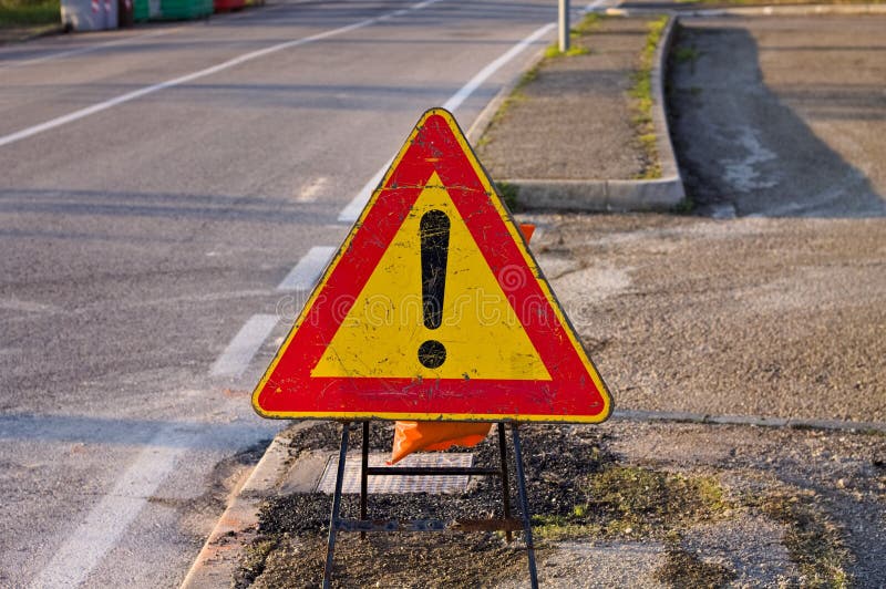 A Triangular Road Sign with an Exclamation Point Indicating Work in ...
