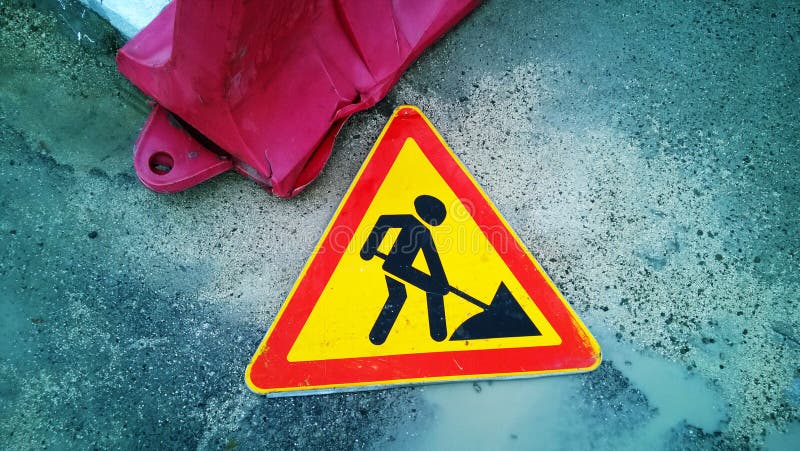 Triangular Road Sign Roadwork Laying on the Ground Stock Image - Image ...