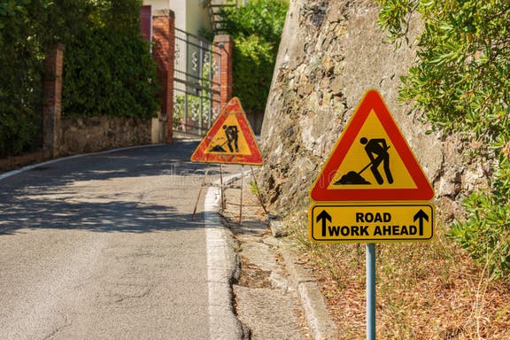 Triangular Road Work Ahead Sign or Work in Progress Sign Stock Photo ...
