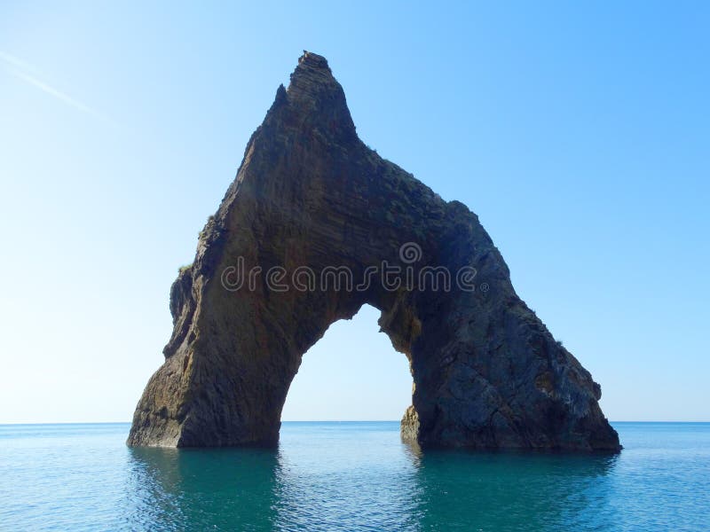 Triangular Rock Balanced on the Tip Stock Image - Image of precarious ...
