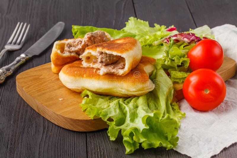 Triangular Russian Belyashi with Meat Stock Photo - Image of food ...