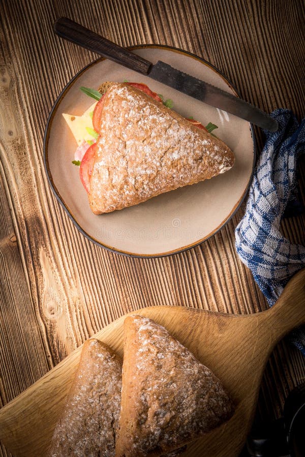 Triangular Sandwich with Cheese, Ham and Tomato Stock Photo - Image of ...