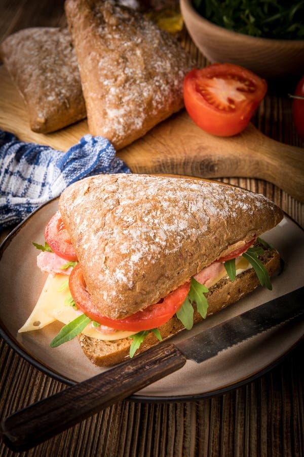 Triangular Sandwich with Cheese, Ham and Tomato Stock Photo - Image of ...