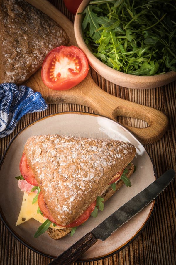 Triangular Sandwich with Cheese, Ham and Tomato Stock Photo - Image of ...