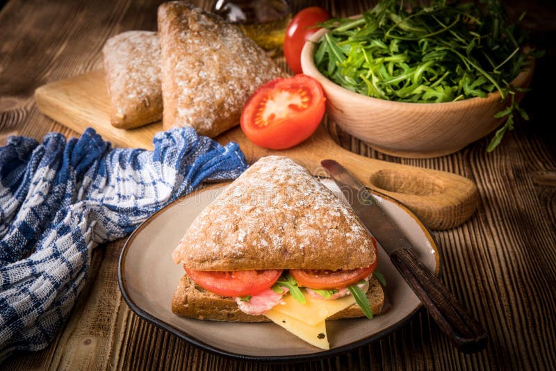 Triangular Sandwich with Cheese, Ham and Tomato Stock Photo - Image of ...