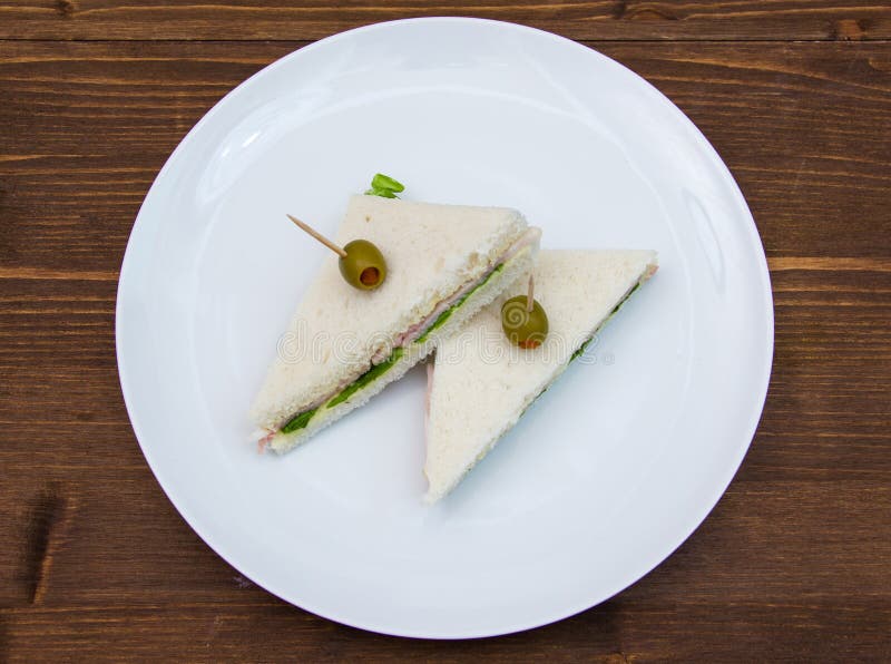 Triangular Sandwiches on Wood from Above Stock Image - Image of ...