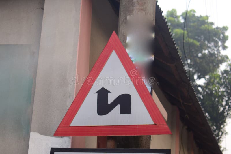 Triangular Shaped Road Sign beside a Road Stock Photo - Image of square ...