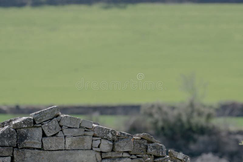 Triangular-shaped Stone Wall with Blurred Background and Plenty of ...