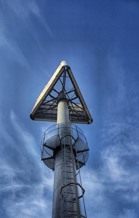 Triangular Sign on a High Steel Pole Stock Image - Image of pole, sign ...