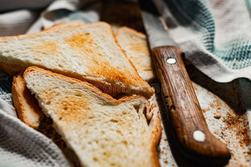 Triangular Slices of Toasted White Bread with a Soft Texture Inside and ...