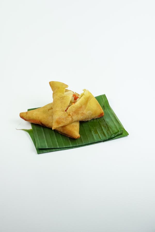 Triangular Spring Roll Snacks with Banana Leaf Base on White Background ...