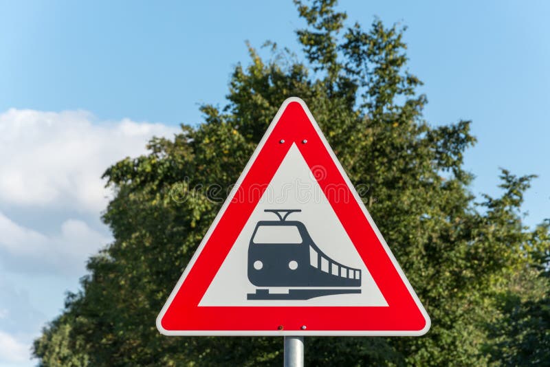 A Triangular Street Sign for Train Tracks Stock Image - Image of stop ...
