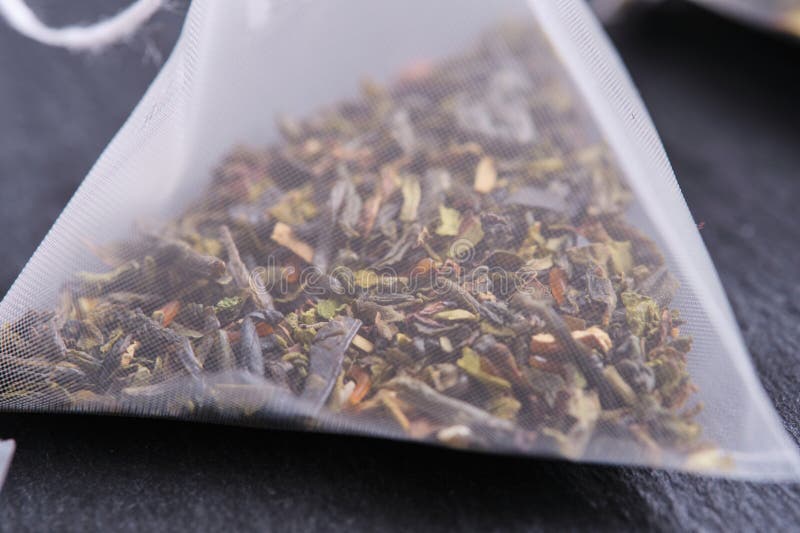 Triangular Teabag with Tea on a Slate. Stock Photo - Image of hanging ...