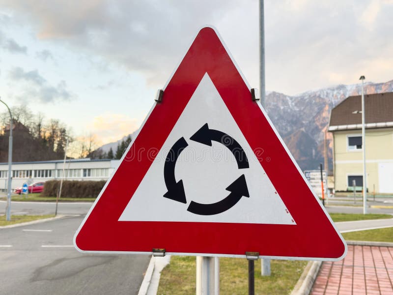 Triangular Traffic Roundabout Warning Sign in Mountainous Landscape ...