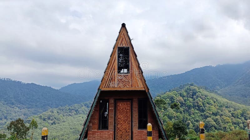 Triangular Wooden House in the Middle of a Vegetable Plantation Stock ...