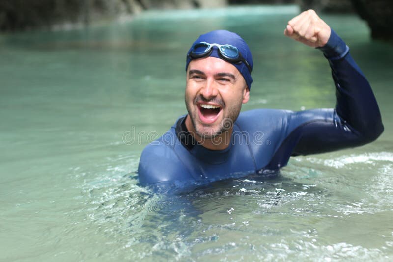 Triathlon Swimmer Celebrating a Victory Stock Photo - Image of handsome ...