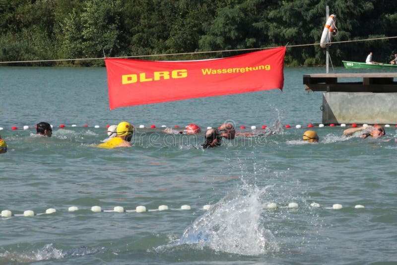 Triathlete Swimmers at Starting Line Editorial Photo - Image of line ...