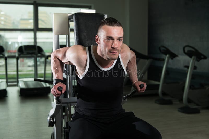 Triceps Exercises on a Machine Stock Photo - Image of caucasian ...