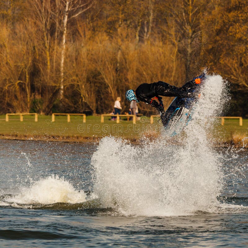 Stunts with a jet ski stock image. Image of outdoors - 140786131