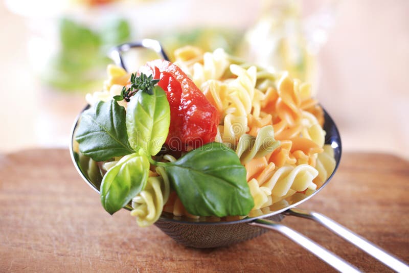 Tricolor corkscrew pasta stock image. Image of dish, cooked - 76110855