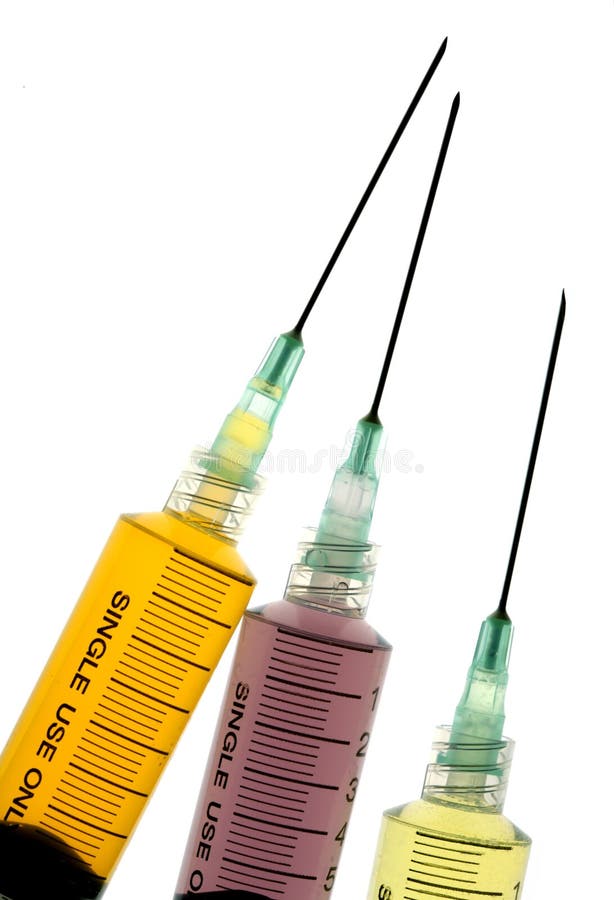 Tricolor vertical syringes stock photo. Image of supply - 1507918
