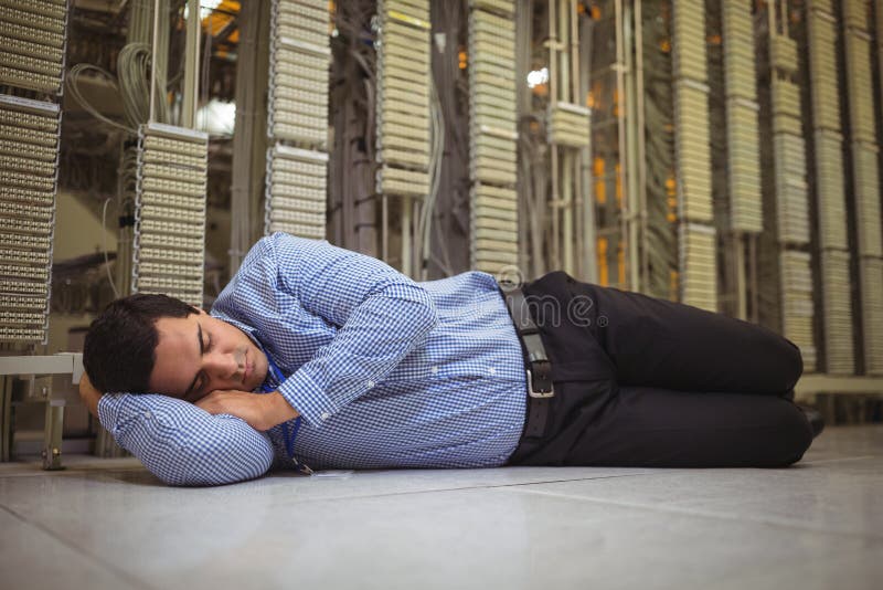 Tried Technician Sleeping on Tiled Floor Stock Image - Image of ...