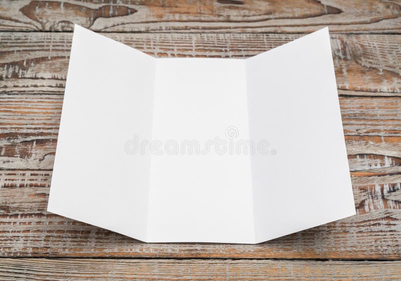 Trifold White Template Paper on Wood Texture . Stock Photo - Image of ...
