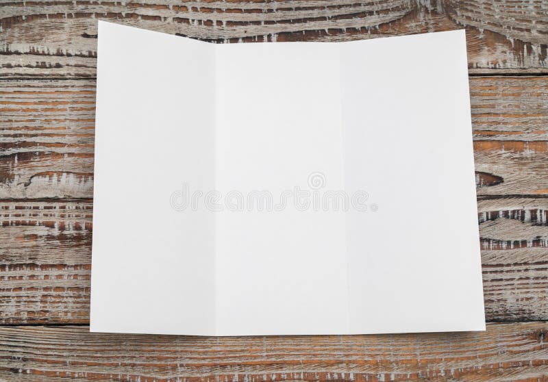 Trifold White Template Paper on Wood Texture . Stock Image - Image of ...
