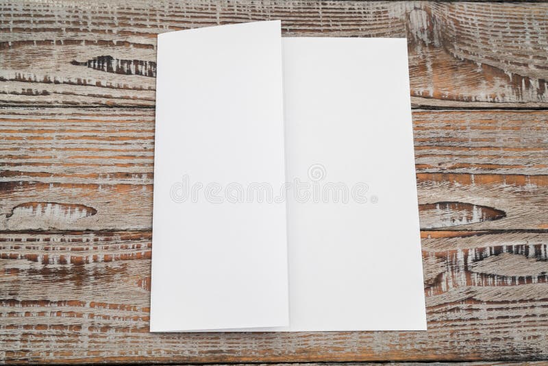 Trifold White Template Paper on Wood Texture . Stock Image - Image of ...