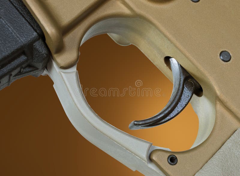 AR-15 trigger on brown stock image. Image of bronze - 136902197