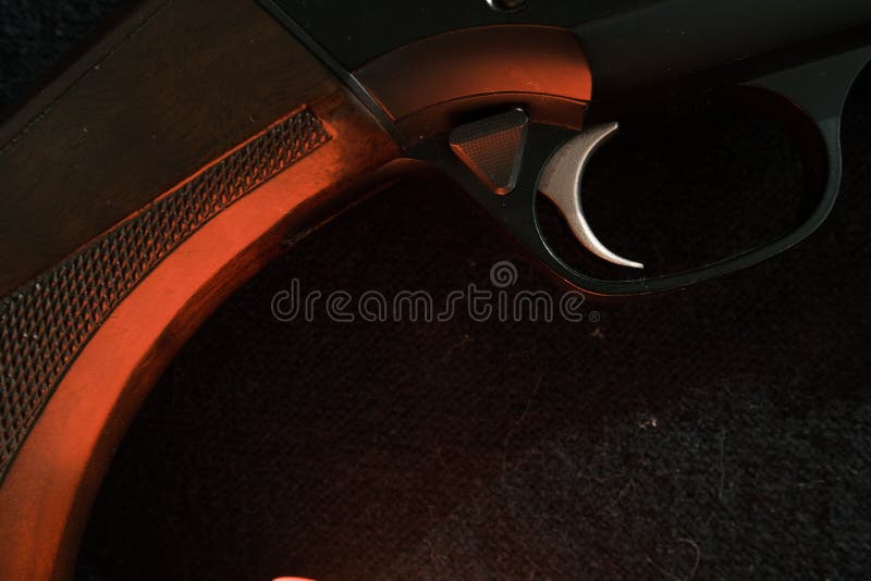 Trigger of a Rifle on Black Background with Red Lightning Stock Photo ...