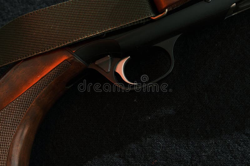 Trigger of a Rifle on Black Background with Red Lightning Stock Photo ...