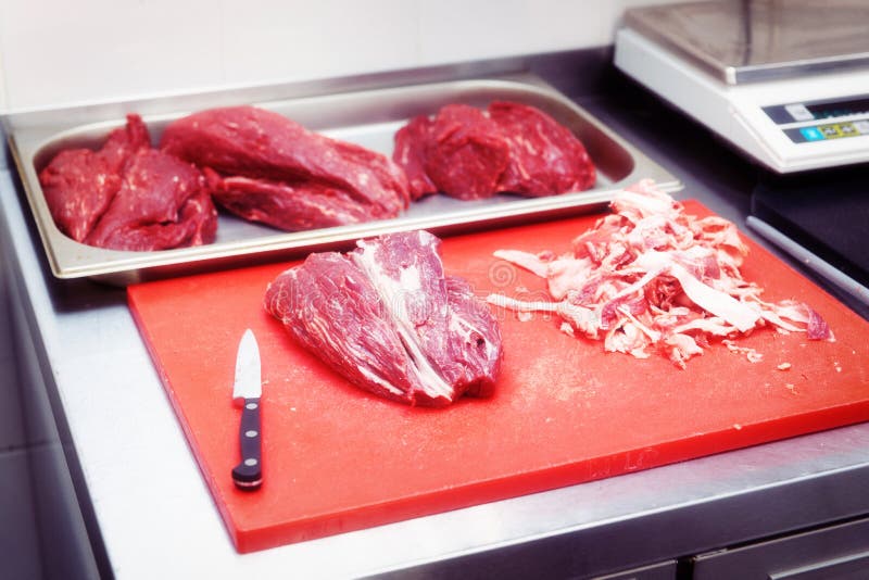 Trimming Meat in a Restaurant, Toned Stock Image - Image of cutting ...