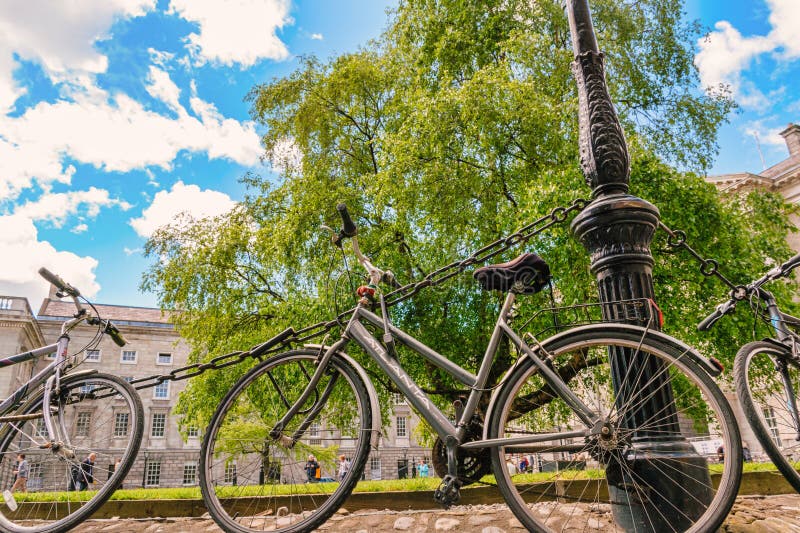 Trinity College Dublin with Parked Bicycle on Cobblestone Path Stock Image - Image of british ...