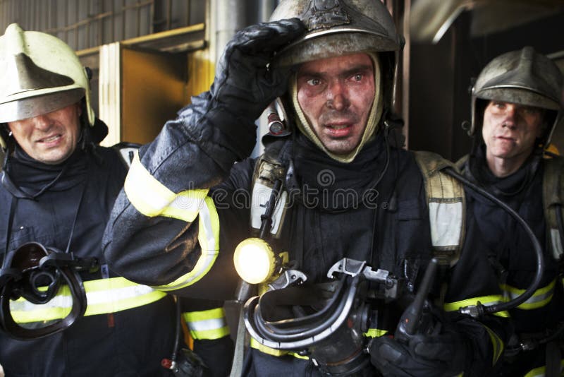 Young Fireman in Uniform in Front of Firetruck Stock Image - Image of ...