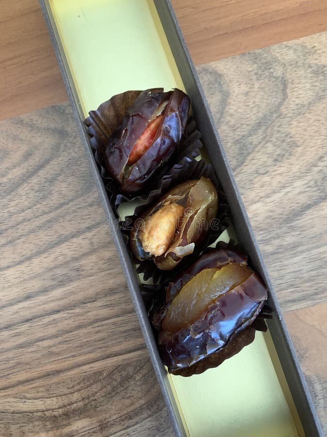A Trio of Assorted Stuffed Dates in a Presentation Gift Box Stock Image ...