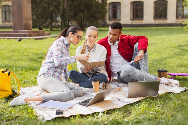 Trio of Diligent Students Feeling Engaged in Serious Project Stock ...