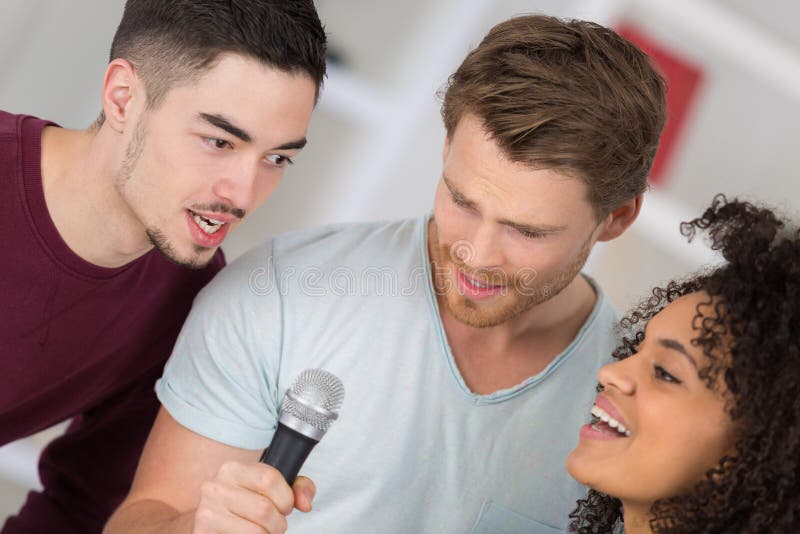 Trio doing a song stock photo. Image of lyrics, profession - 148278120